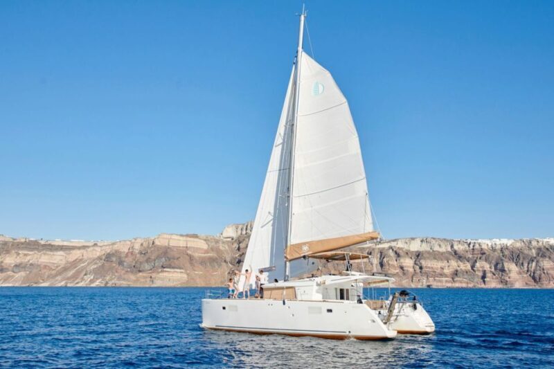 Santorini Gold Catamaran Cruise with Snorkel, BBQ & Open Bar - The Sum Up
