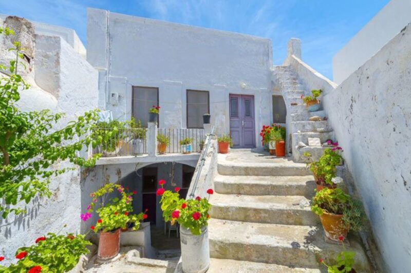 Santorini Island Bus Tour and Caldera Sunset Cruise - Sunset in Ia: The Perfect Finish