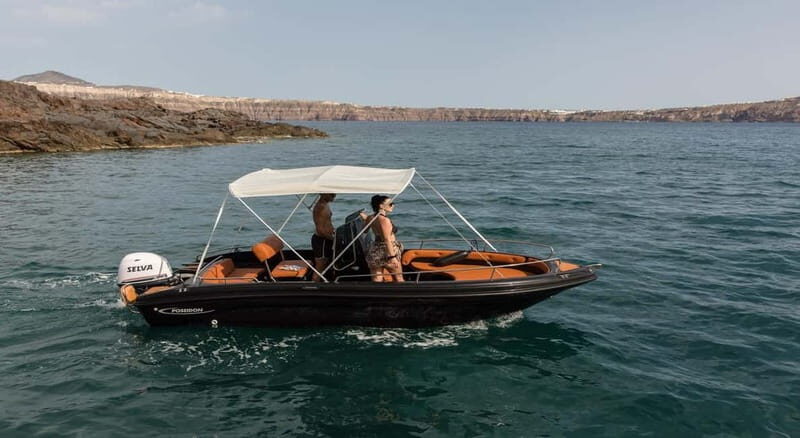 Santorini: License free Luxury boat and snorkeling included - Key Points