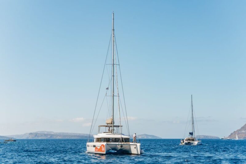 Santorini: Luxury Catamaran Day Trip with Meal and Open Bar - Key Points