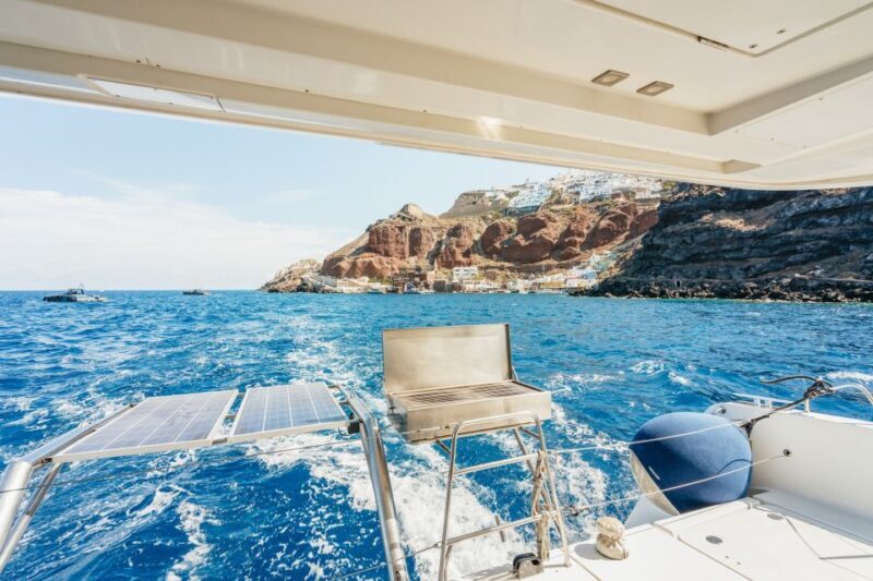 Santorini: Luxury Catamaran Day Trip with Meal and Open Bar - How It Feels Onboard