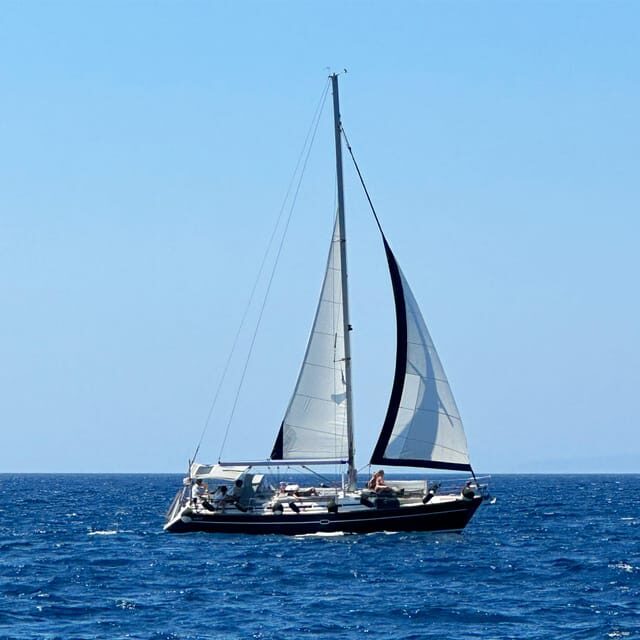 Santorini: Sailing Yacht cruise with full meal and drinks - Santorini: Sailing Yacht Cruise with Full Meal and Drinks — An Authentic Aegean Experience