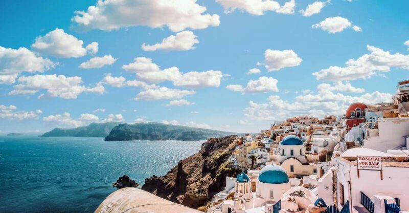 Santorini Tour : Oia, Black Beach, and Pyrgos Half-Day Tour - Stop 1: Pick-up and Introduction