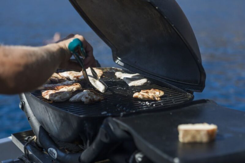 Santorini: Traditional Wooden Boat Tour with Meal and Wine - What to Expect from the Santorini Wooden Boat Tour