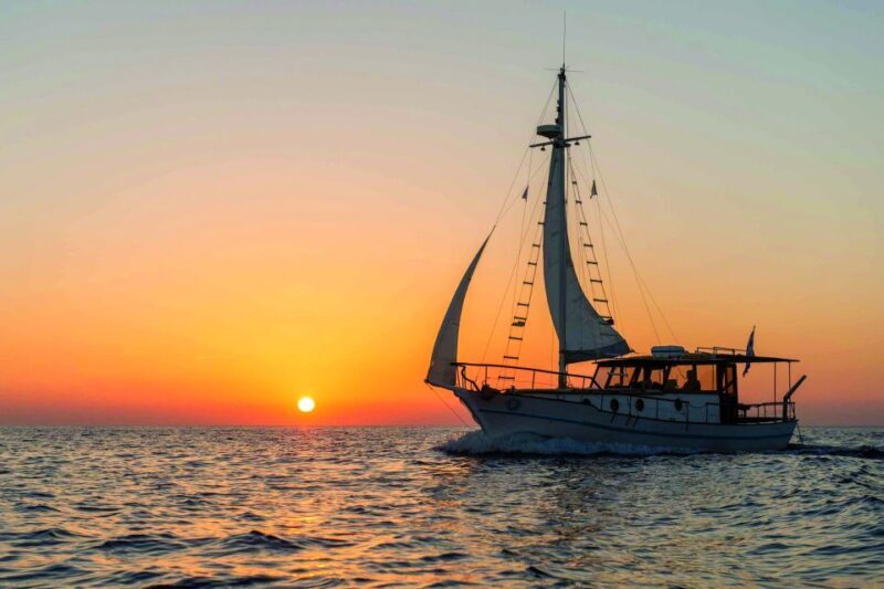 Santorini: Traditional Wooden Boat Tour with Meal and Wine - FAQs