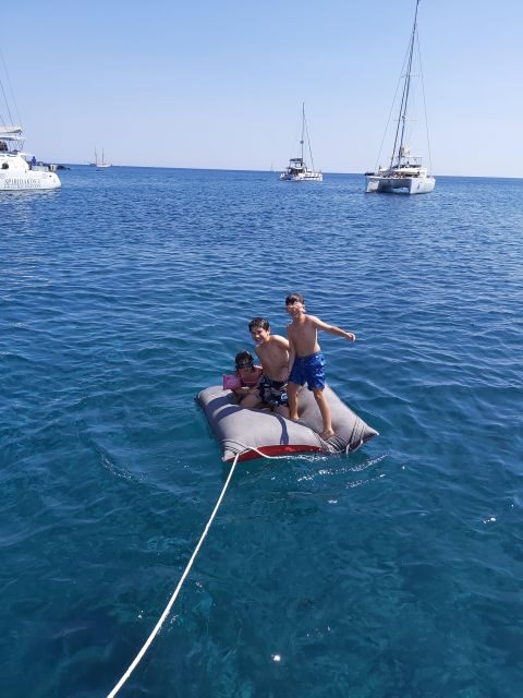 Santorini:Catamaran: private cruise with food & drinks - Who Should Book This Tour?
