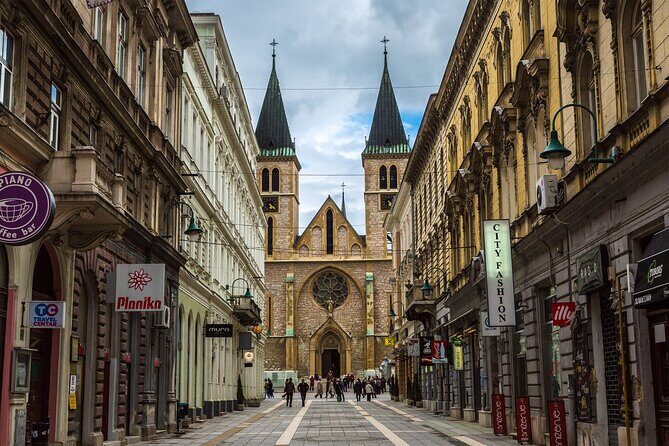 Sarajevo Uncovered: Old Town Tour with Coffee and Food Tasting - Sacred Heart Cathedral: Architectural Grandeur and Faith