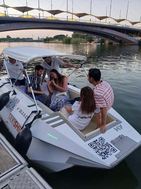 Seville from the River: Electric water taxi ride, TAXI SHIP. - Detailed Breakdown of the Experience