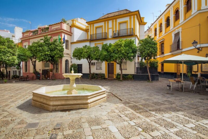 Seville: Relaxing City Bike Tour with a Tour Guide - Key Points