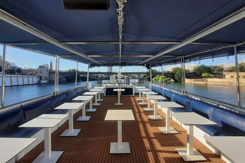 Seville: Restaurant boat ride on the Guadalquivir River with lunch/dinner - An In-Depth Look at the Experience
