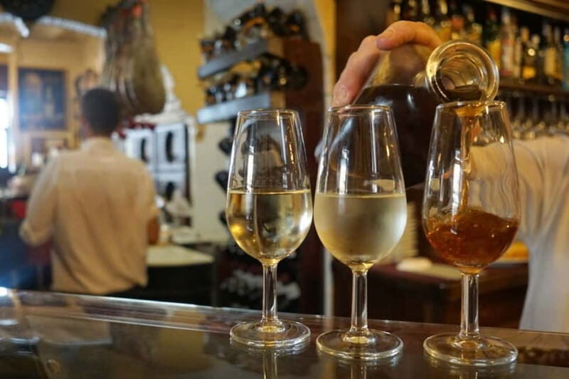 Seville: Tapas Walking Tour with Traditional Flamenco Show - Key Points