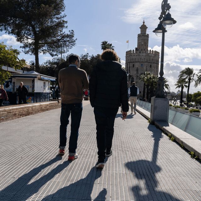 Seville: Tiny-Group Triana Iconic Neighborhood Walking Tour - Authentic Encounters and Reviews