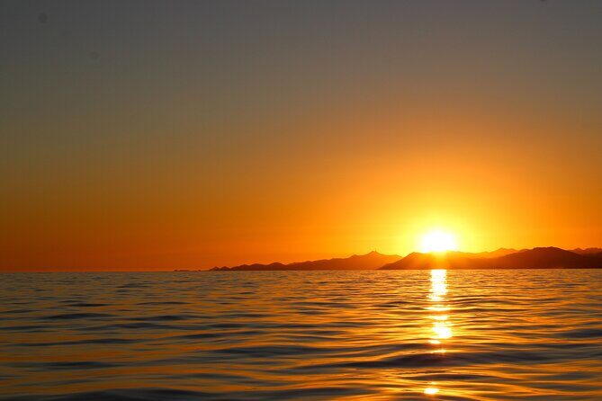 Shared Cabo Sunset Cruise with Open Bar and Scenic Views - In-Depth Look at the Experience