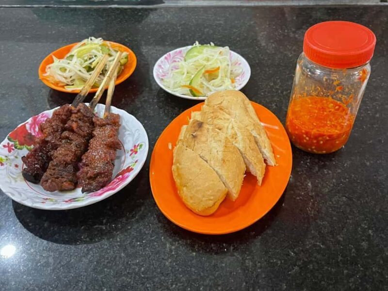 Siem Reap: Evening Street Food Tour by Tuk-Tuk - The Main Course at a Local Restaurant