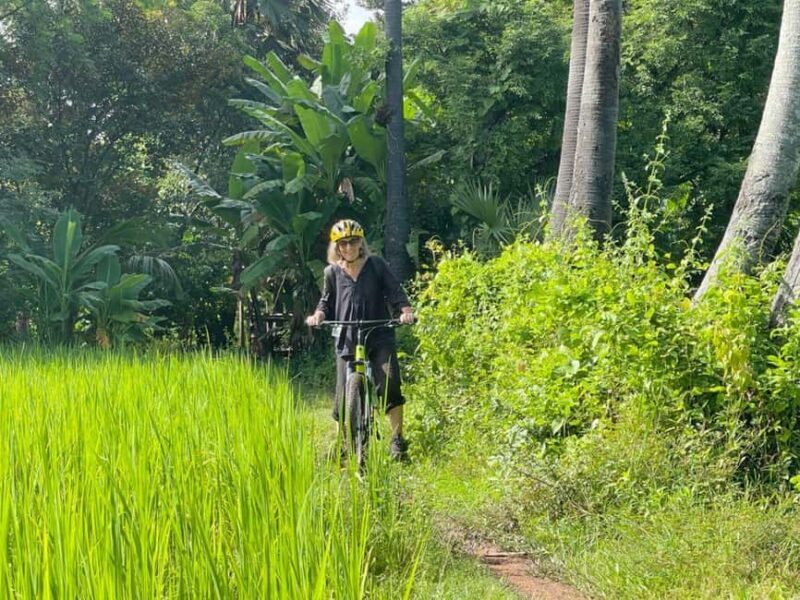 Siem Reap: Sunrise Bike Tour with Monk Blessing & Breakfast - The Sum Up