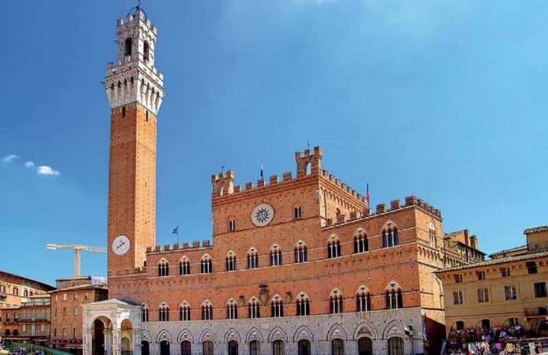 Siena: Contrade Walking Tour with Contrada Museum Entry - Walking Through Siena’s Historic Neighborhoods