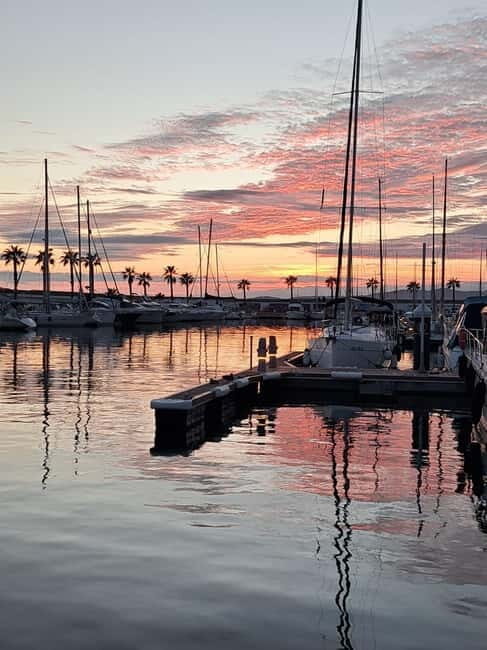 Sitges Sunset: Guided Tour by Sailboat along the Sitges Coast. - The Weather and Cancellation Policy