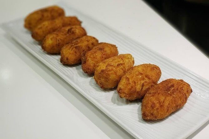 Small Group Tapas and Paella Cooking Class in Madrid - Authentic Flavors and Friendly Atmosphere