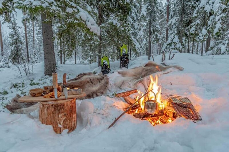 Snowshoe experience with traditional beverages in Lapland - An authentic Arctic adventure in Lapland