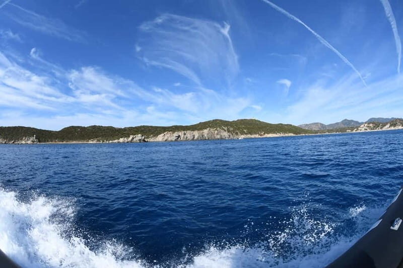 Southern Sardinia: 4-hour dinghy rental with skipper in Villasimius - The Sum Up