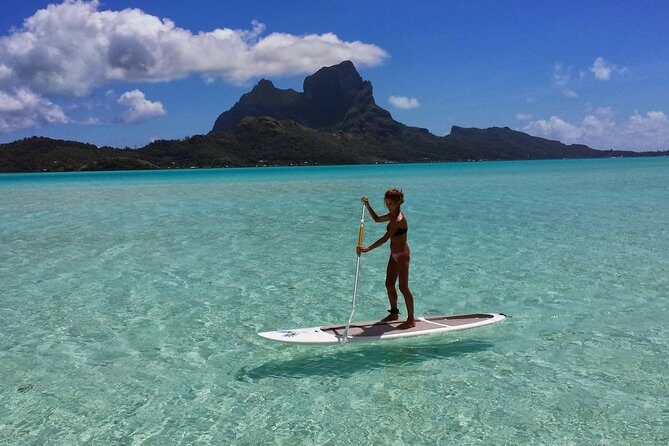 Stroll out of time on the lagoon of Bora Bora - A peaceful, scenic paddleboarding journey