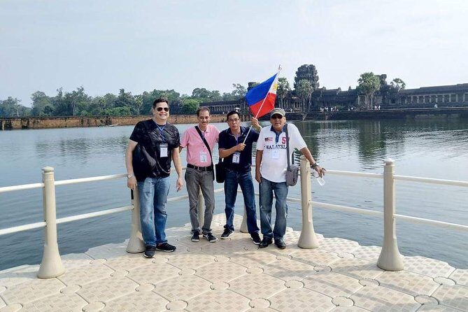 Sunrise Angkor Wat, Bayon and Ta Prohm -Share Tour (half day) - The Marvel of Bayon: Intricate Smiles and Grand Architecture