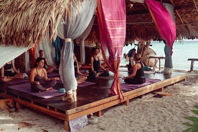 Sunrise yoga class overlooking the beach, the sea & sunrise . - The Sum Up: Is It Worth It?