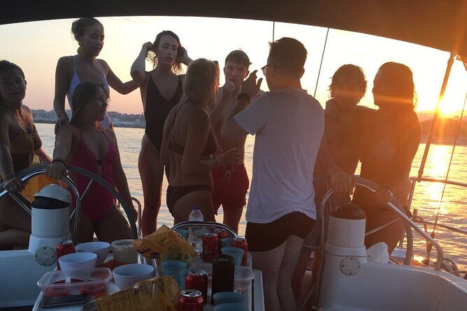 Sunset boat trip with open bar of cava (local champagne) - Key Points