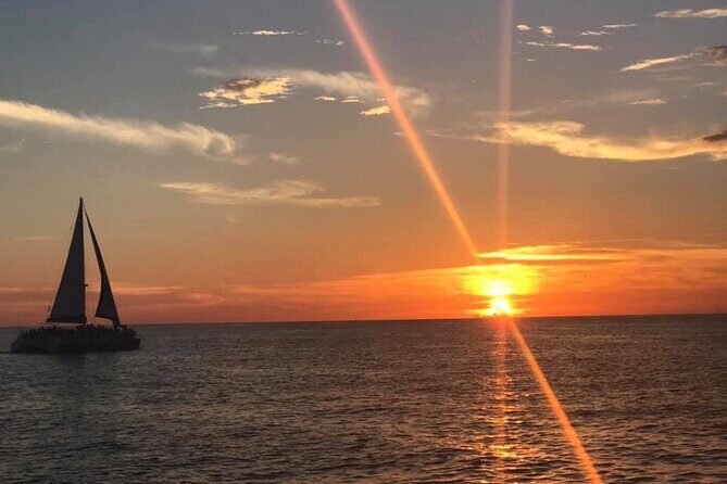 Sunset & Dolphin Sightseeing Sail Aboard the Lazy Daze Catamaran - Key Points