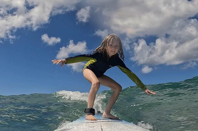 Surf Lessons get your Social Media video & photos you Surfing HI. - The Sum Up
