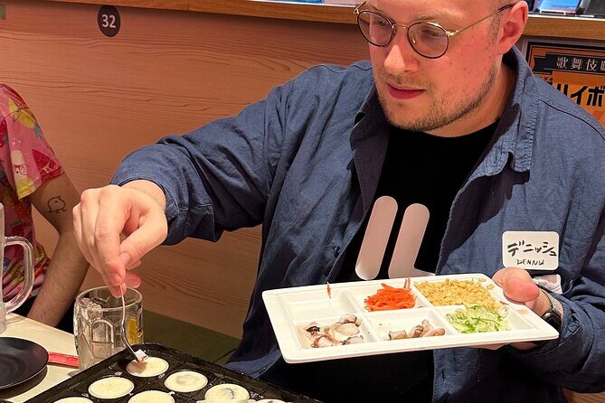 Takoyaki Party & Shinjuku Night Tour in Tokyo Unlimited Drinks - The Takoyaki Making Experience