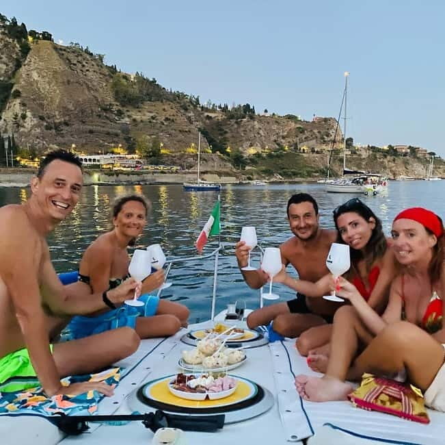Taormina: Dolphin Search with Sunset Aperitif in Group Boat - A Close Look at the Experience