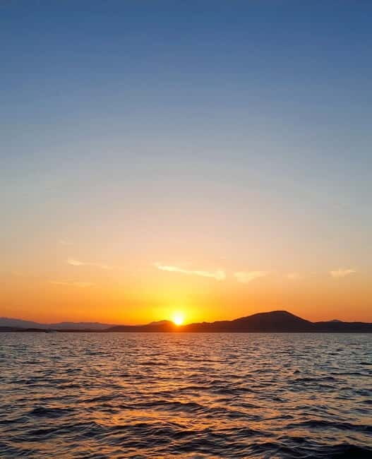 Tavolara: Sunset Aperitif Tour with Drinks and local snacks - Key Points