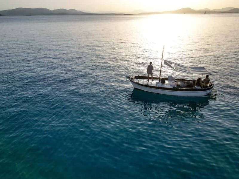 Tavolara: Sunset Aperitif Tour with Drinks and local snacks - What Travelers Can Expect at Each Stop
