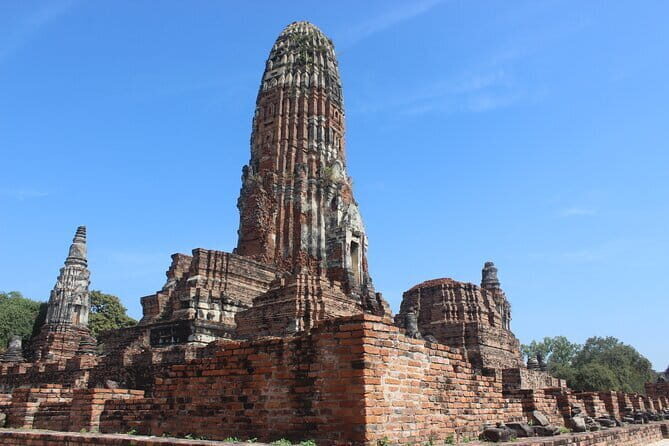 Three Temple Ayutthaya Tour with Scenic Boat Ride - Exploring the Ancient Ruins: A Walk Through History