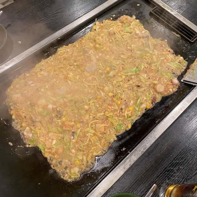 Tokyo: Hidden Food Gems in Tsukishima - Monjayaki & Sashimi - The Sum Up