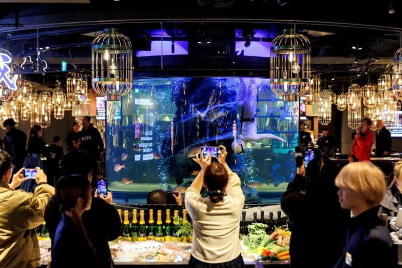 Tokyo: Japanese Experiece Dinner with Diving Ama Performance - Key Points