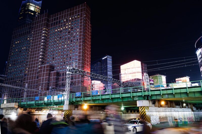 Tokyo: Shinjuku District Guided Walking Tour at Night - Authenticity and Surprises