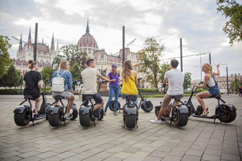 Top sights of Pest downtown on e-scooters incl. Parliament - The Value of the Experience