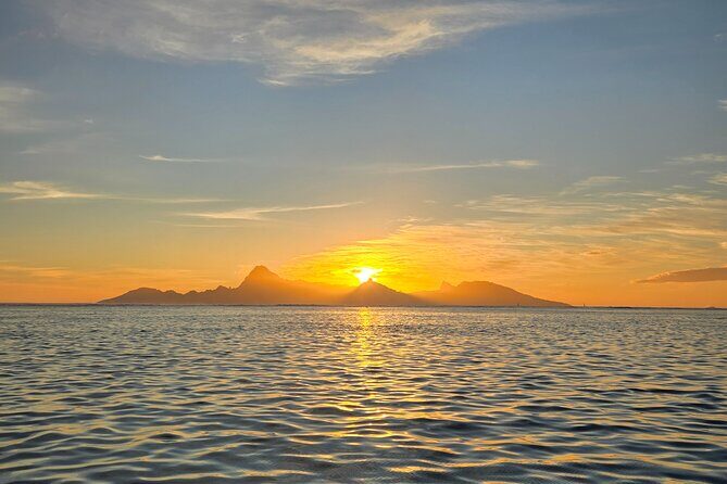 Unforgettable sunset against Moorea - Setting the Scene: A Private Light Show at Sea
