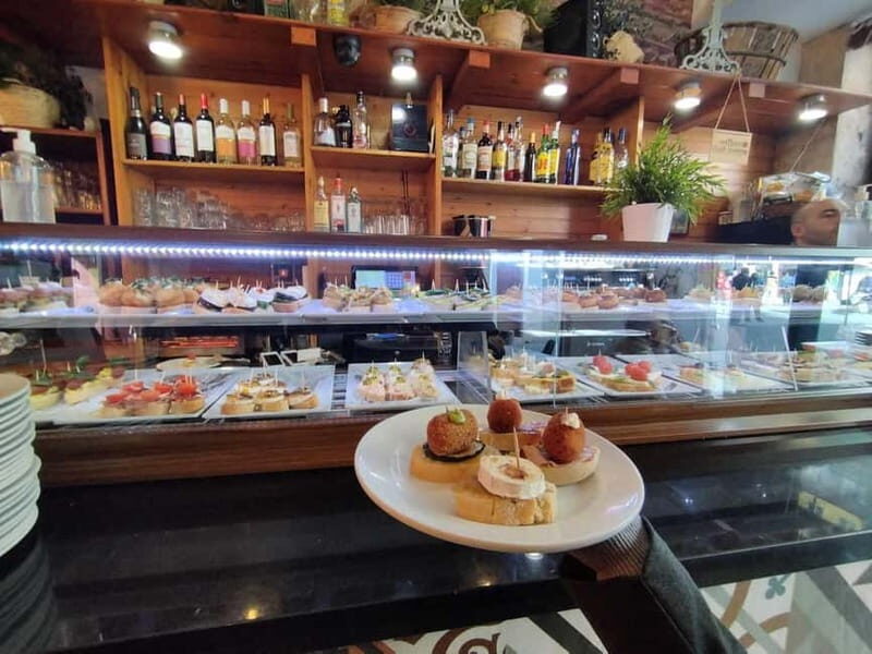 Valencia: Market Food Tour Including Tapas & Paella Tasting - Exploring Valencia’s Old Town
