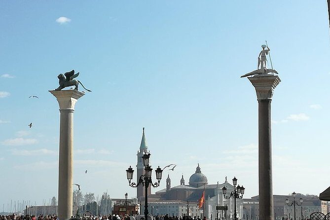 Venice by Train from Rome: Enjoy a Private Day Tour Experience - Climbing the Campanile and Enjoying the Views