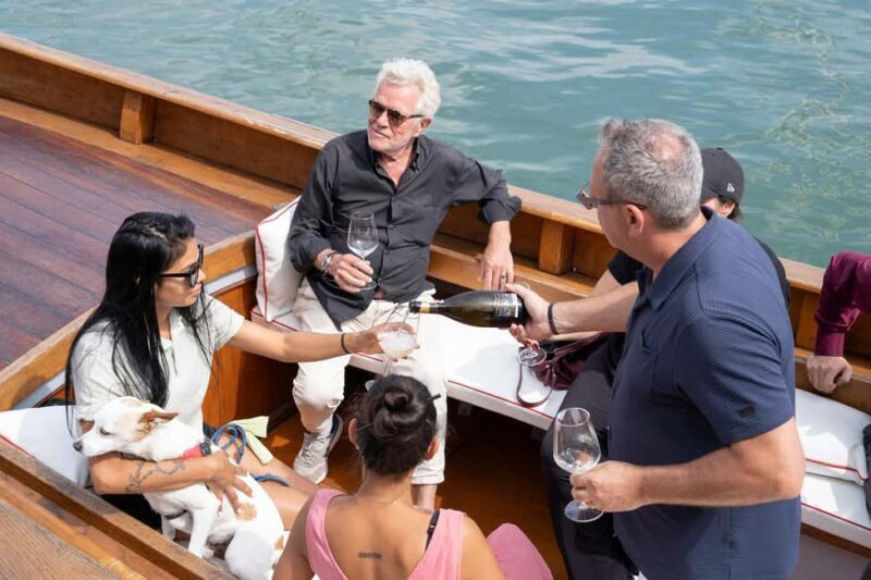 Venice from another point of view: Sightseeing tour in a traditional boat. - The Value of This Experience