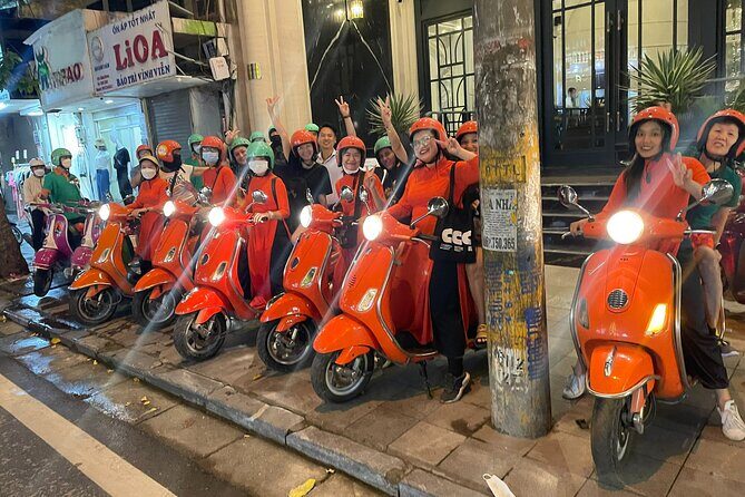 Vespa Female Ao Dai riders Night Street Food + Train Street Tour - An Authentic Night in Hanoi: The Experience Breakdown