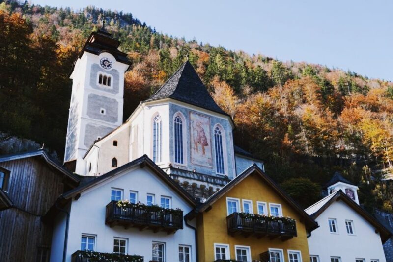 Vienna: Hallstatt & Alpine Peaks Day Trip with Admont Abbey - The Transportation and Guide Experience