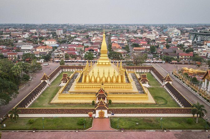 Vientiane by Bike Full-Day Private Tour with Buddha Park - The Experience in Context