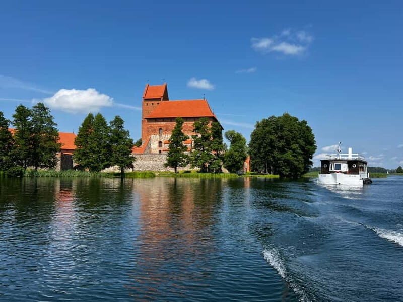 Vilnius: Trakai, Uzutrakis Manor, Hill of Angels, Boat Ride - Key Points