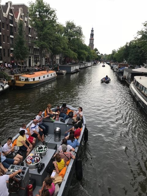 Visit Amsterdam by Boat with a French Guide (french) - Key Points