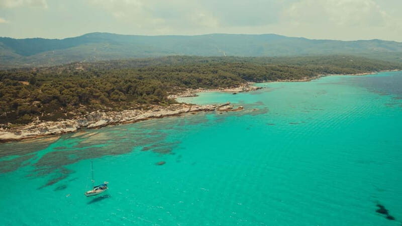 Vourvourou: Private Cruise to Orange Beach & Sithonia Coast - Transportation and Meeting Details