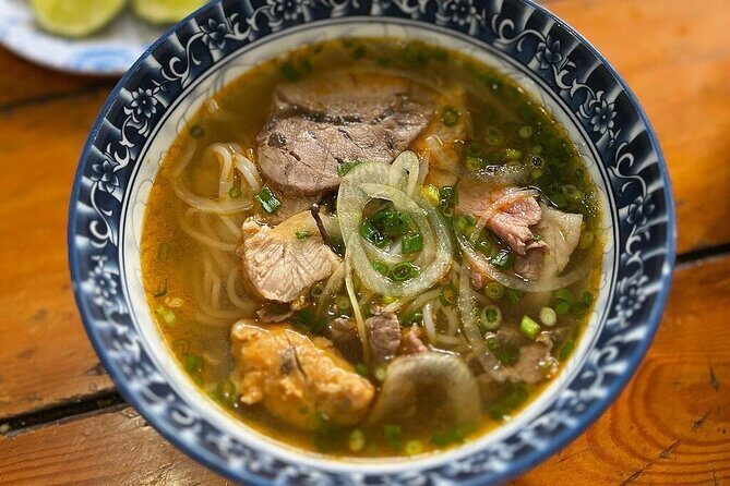 Walking Food Tour in Hue Traditional Dishes & Hidden Gems - Key Points